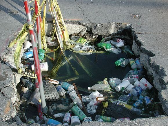 Compilation of dangerous holes in roads (18 pics) - Izismile.com